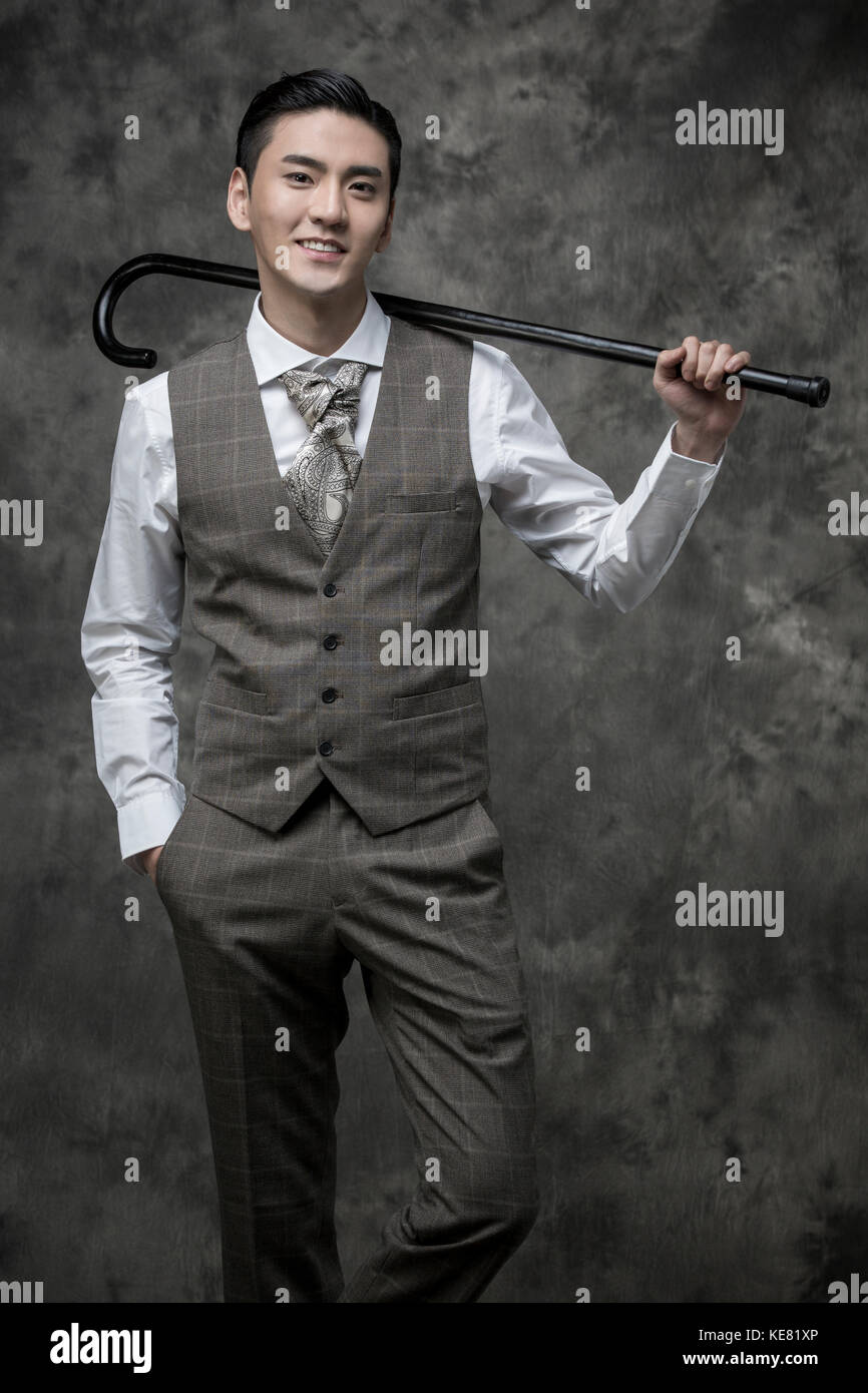 Man Cane Suit High Resolution Stock Photography and Images - Alamy