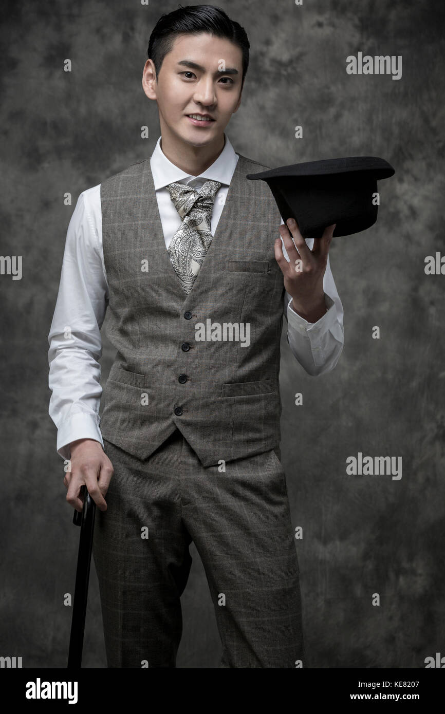Cane man hat suit hi-res stock photography and images - Alamy