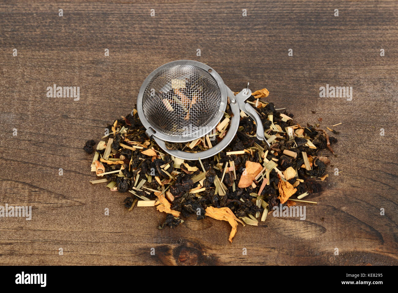 organic tea leaves with infuser ball Stock Photo - Alamy