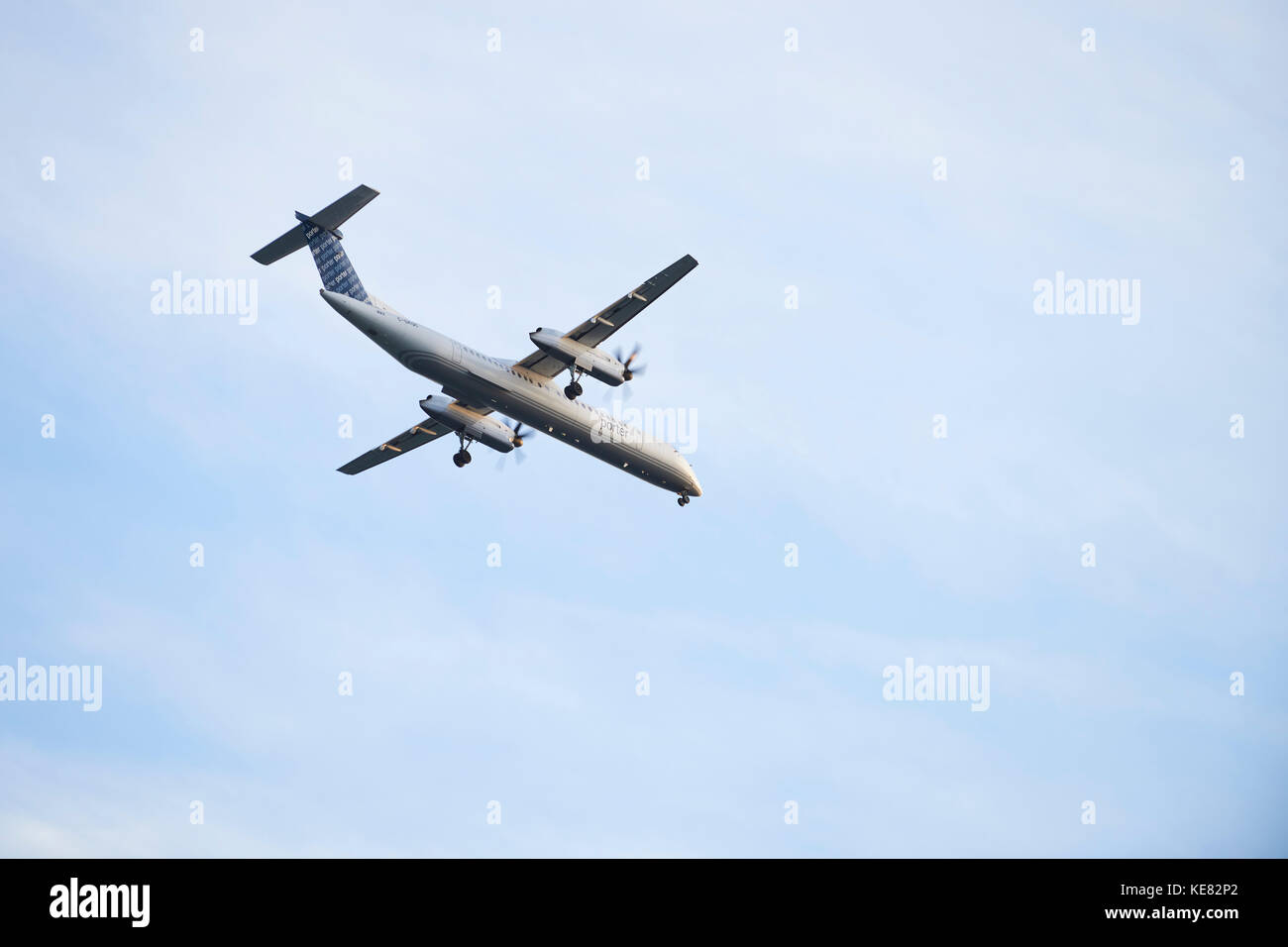 A Plane Flying Overhead From Billy Bishop Toronto City Airport; Toronto ...