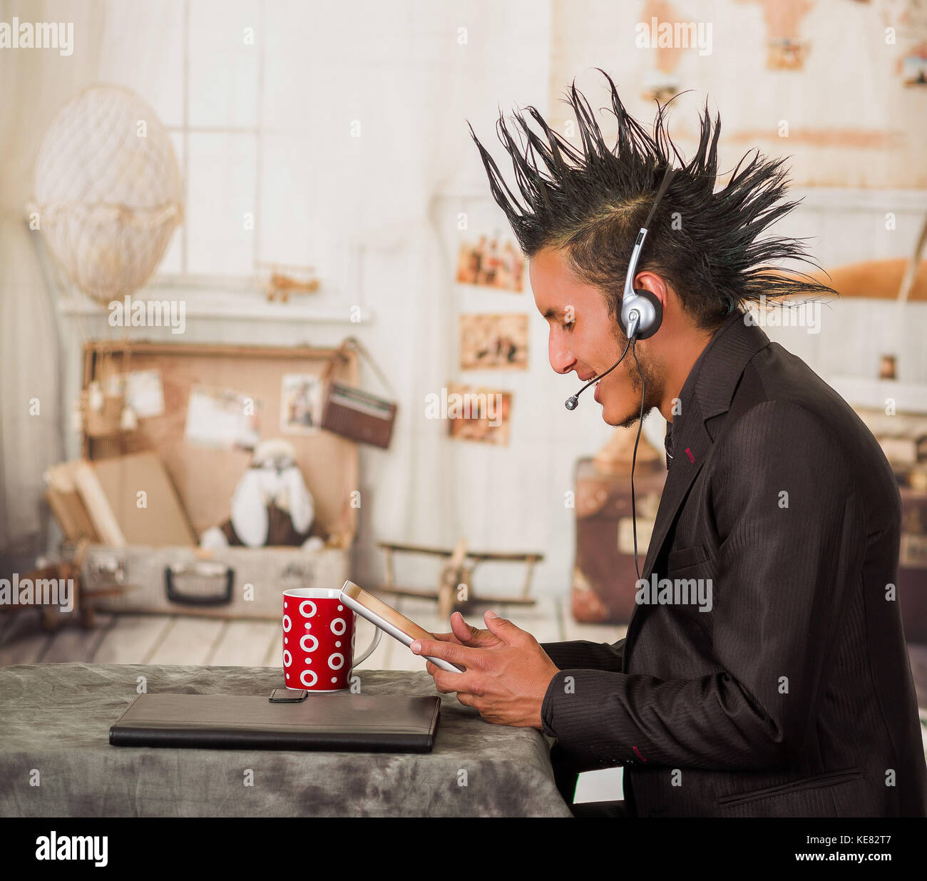 Close up of office punk man, wearing a suit with a crest hair style ...