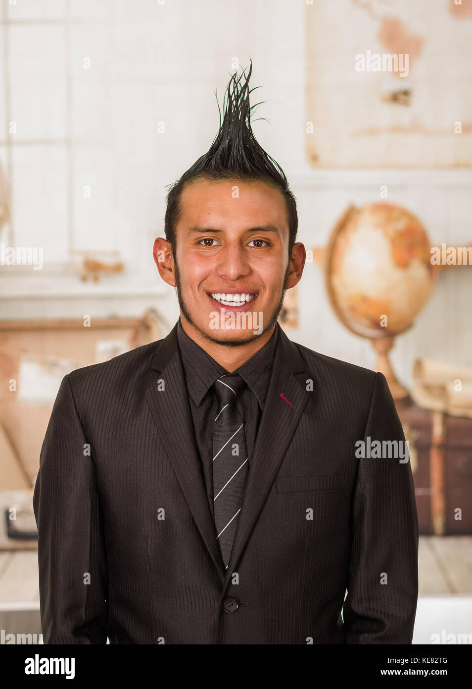 Close up of office punk worker wearing a suit with a crest in a blurred ...