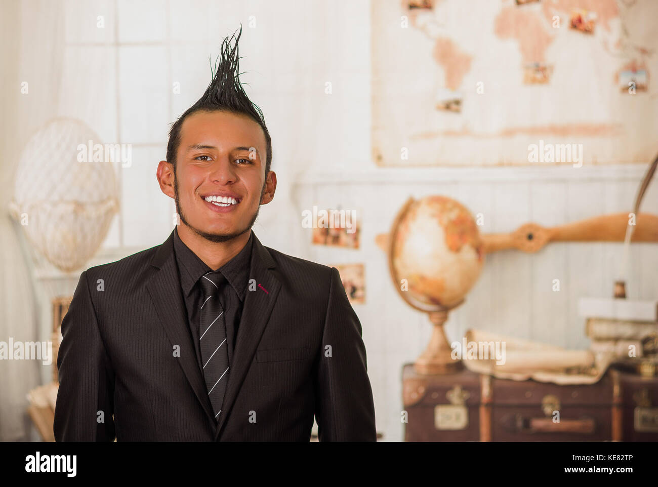 Close up of office punk worker wearing a suit with a crest in a blurred ...