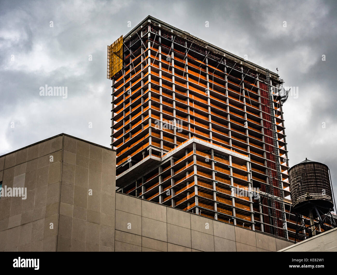 Skyscraper, building under construction in NYC Stock Photo - Alamy