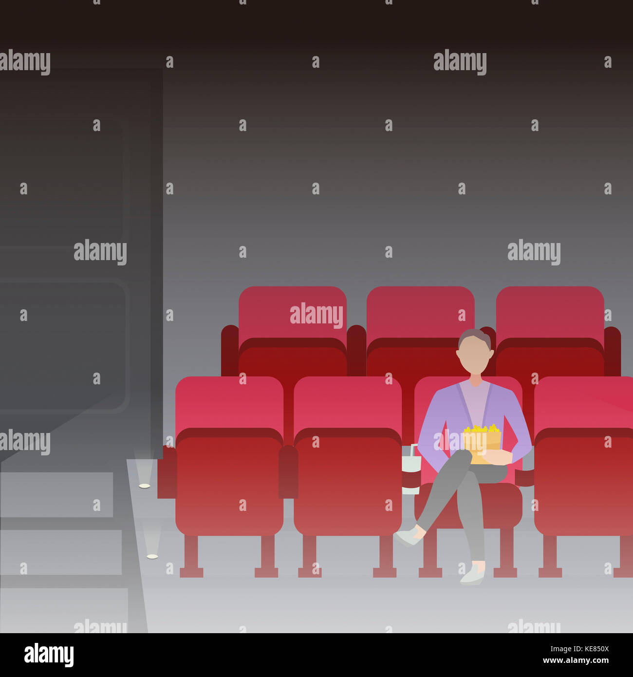Single man watching a movie alone at movie theater Stock Photo - Alamy