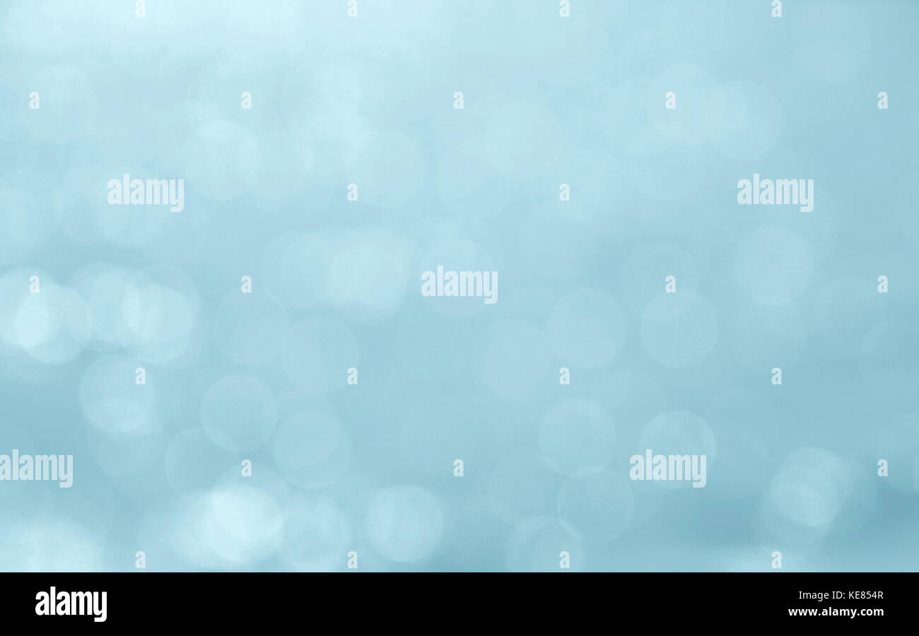 Abstract blue color blurred bokeh light / water reflection for ...