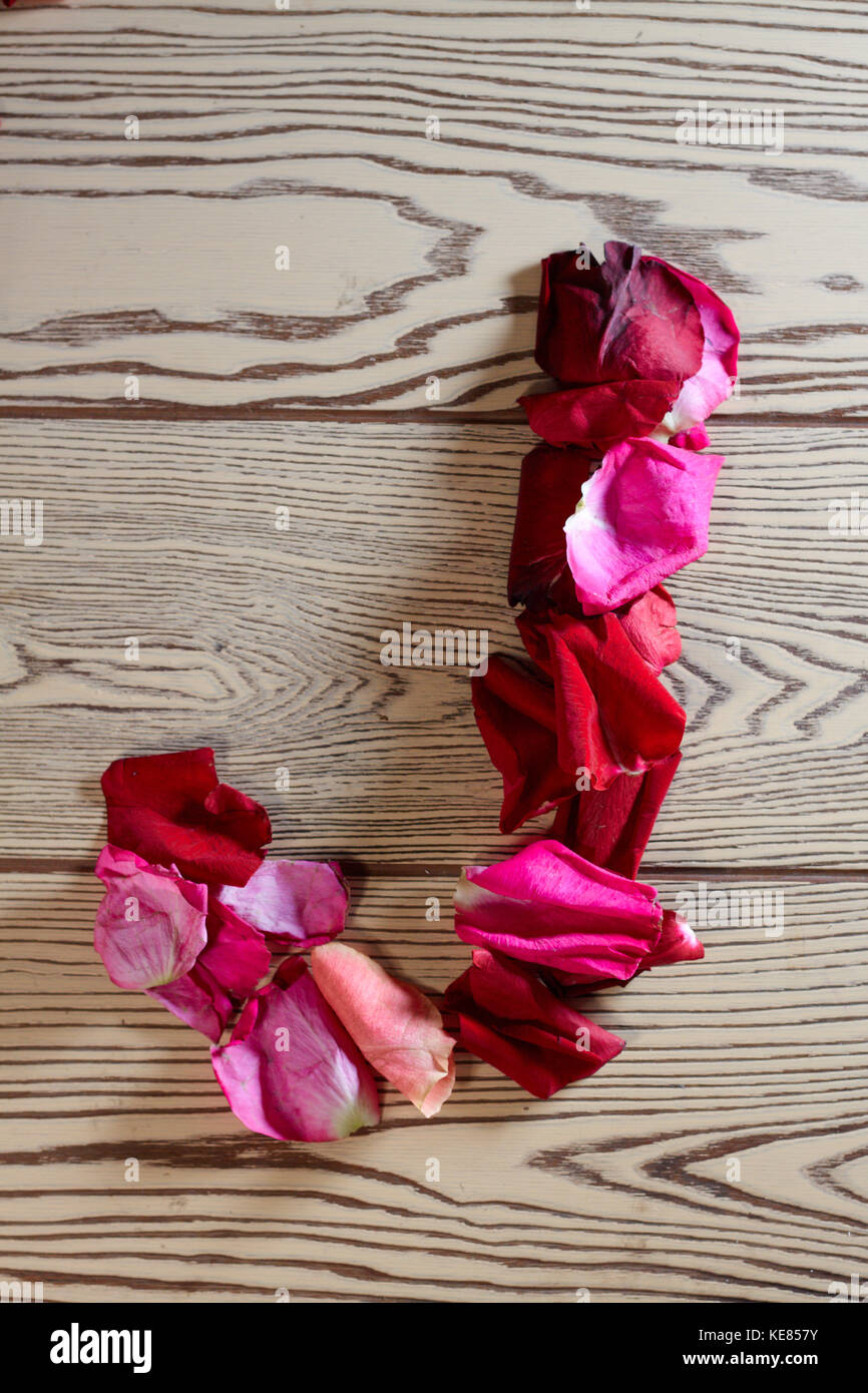 of rose petals alphabet Stock Photo - Alamy