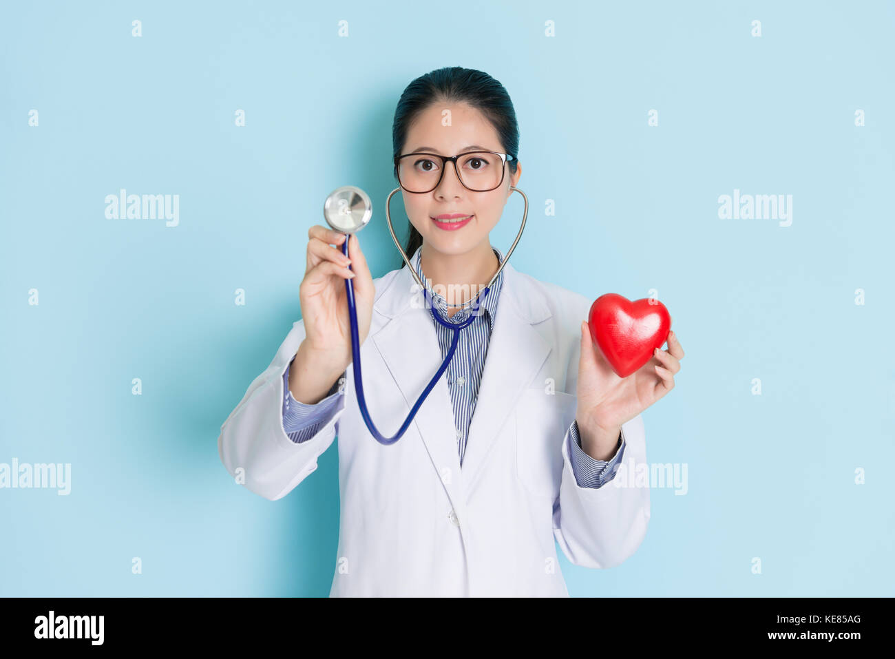 confident beautiful woman rights cardiology doctor using stethoscope ...