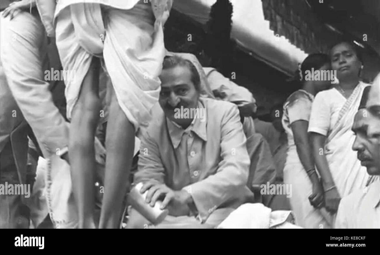 Meher Baba washing feet of poor Stock Photo - Alamy