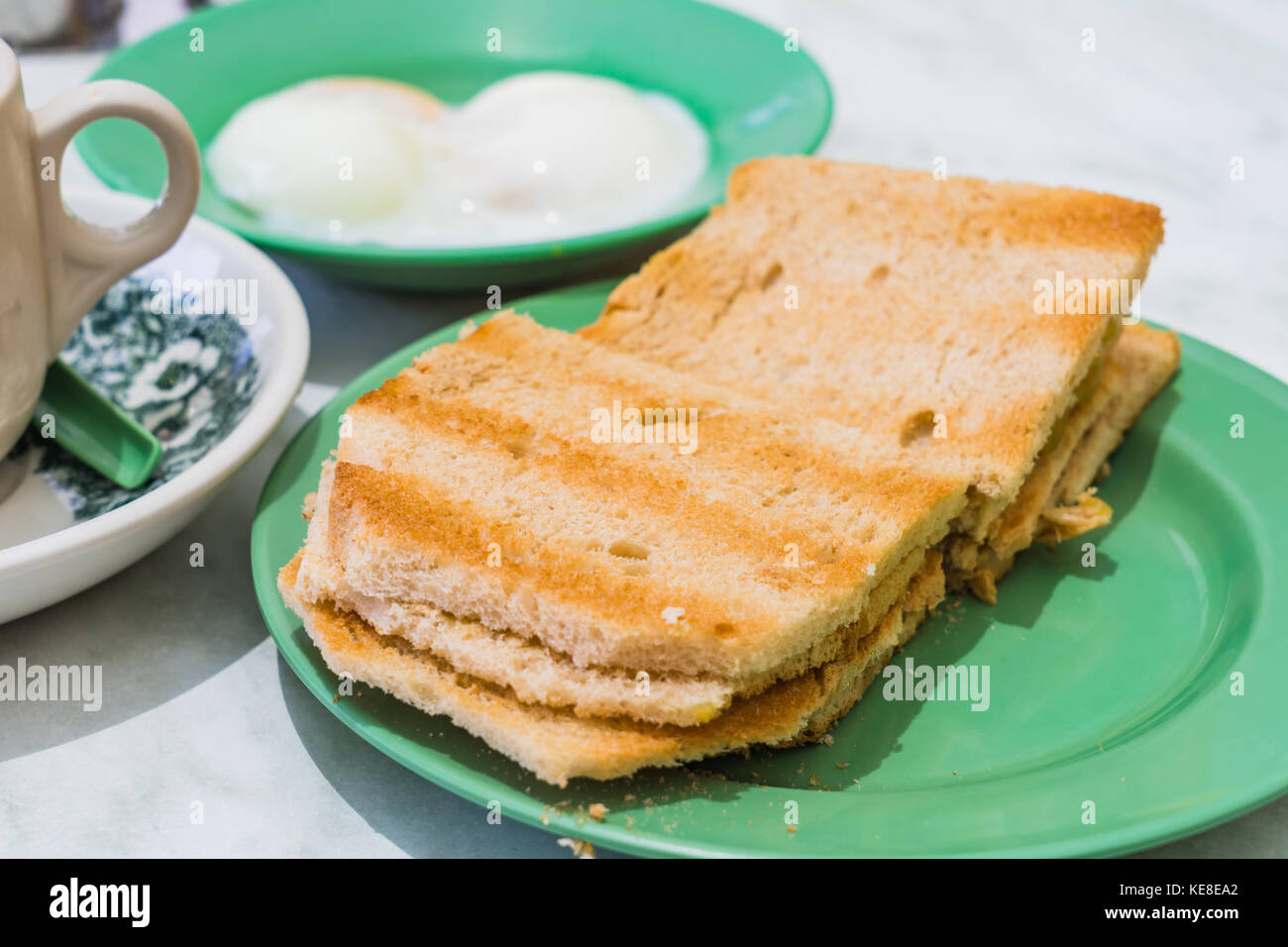 Traditional Singapore Breakfast called Kaya Toast, Bread with Coconut ...