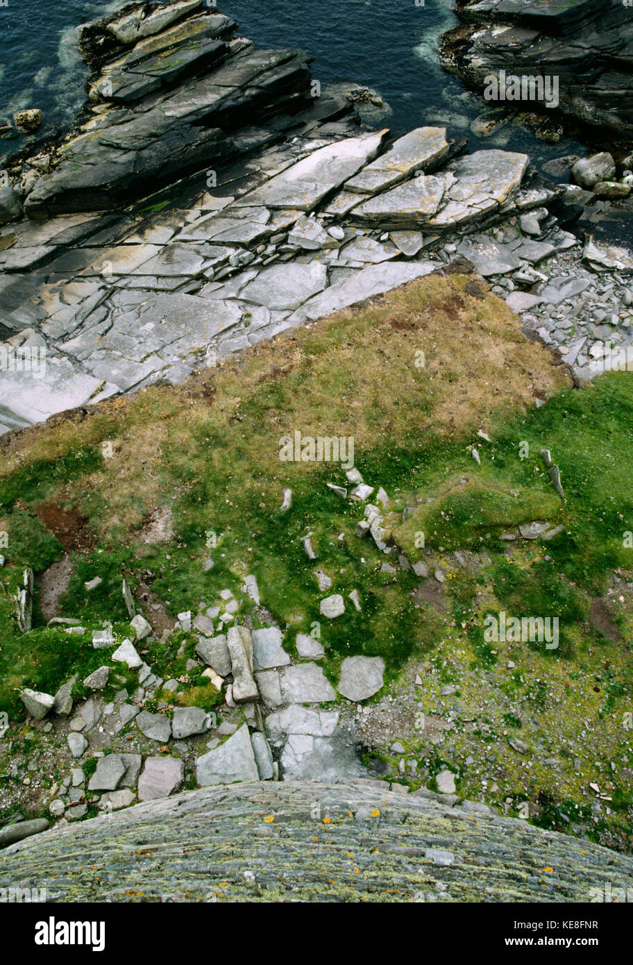 Looking down from top of the broch wall above the entrance, showing ...