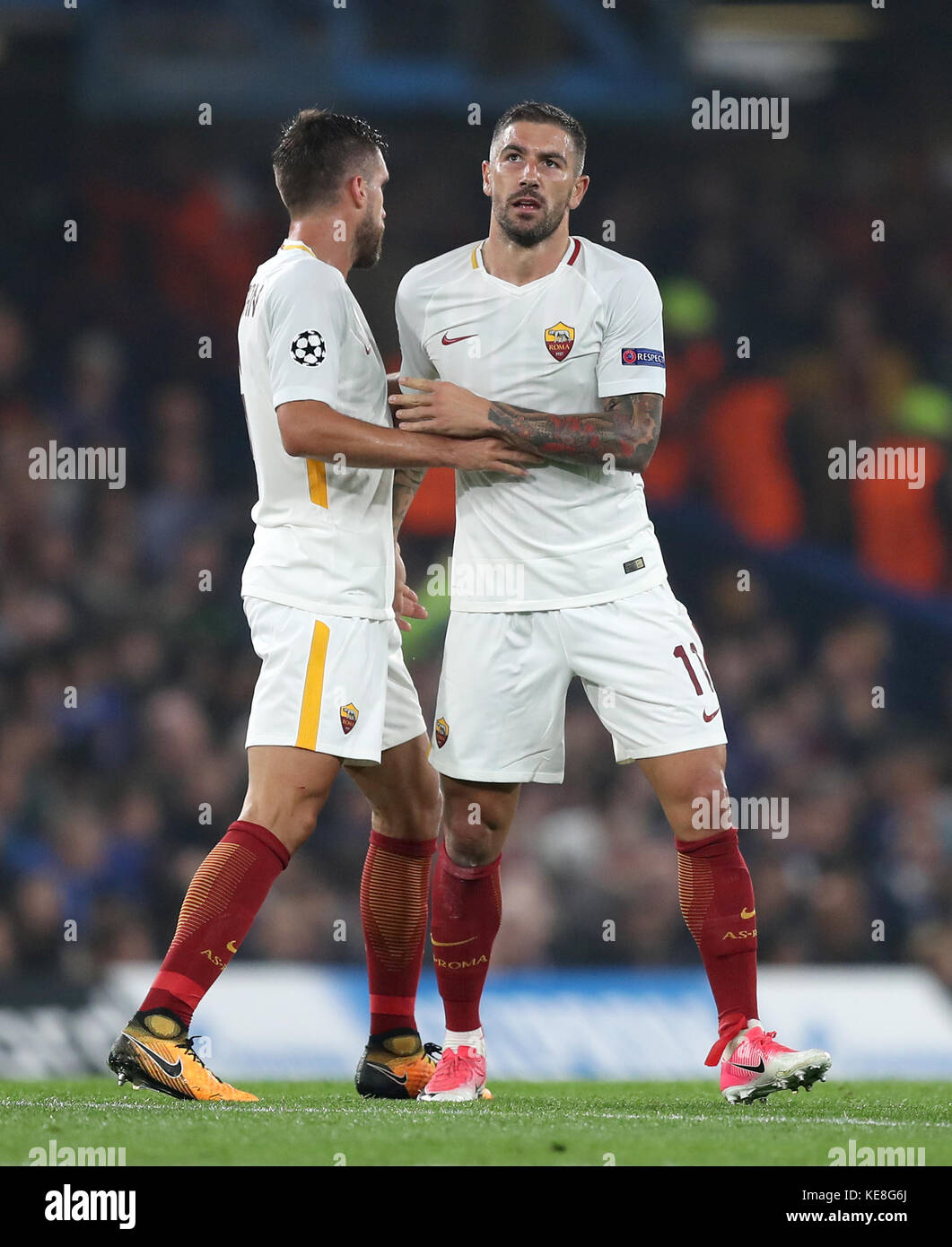 Roma's Aleksandar Kolarov (right) celebrates scoring his side's first ...