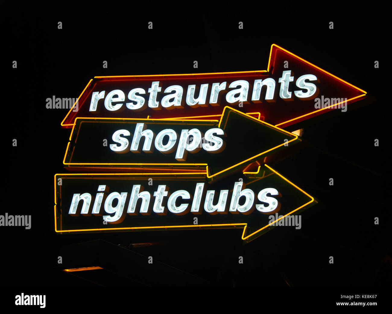 Sign pointing to nightlife Stock Photo - Alamy