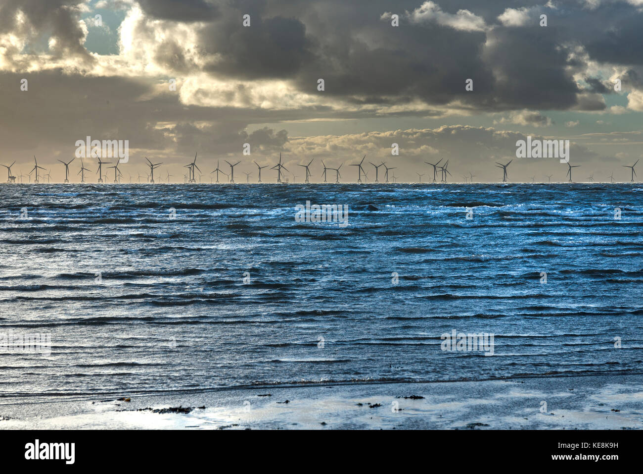 Offshore wind Farm viewed from the sea shore at Sandy Gap Lane, Walney ...