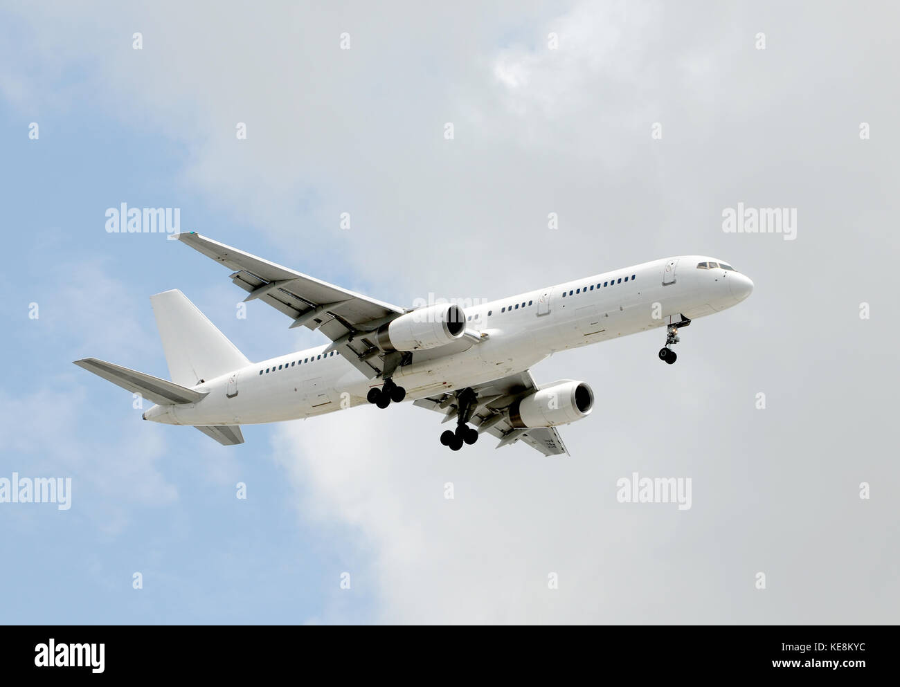 Modern passenger jet in unmarked white color scheme Stock Photo - Alamy