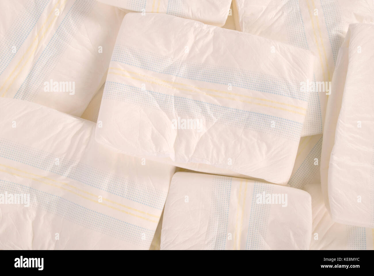 Pile of XXXL diapers. Background of big nappies Stock Photo - Alamy
