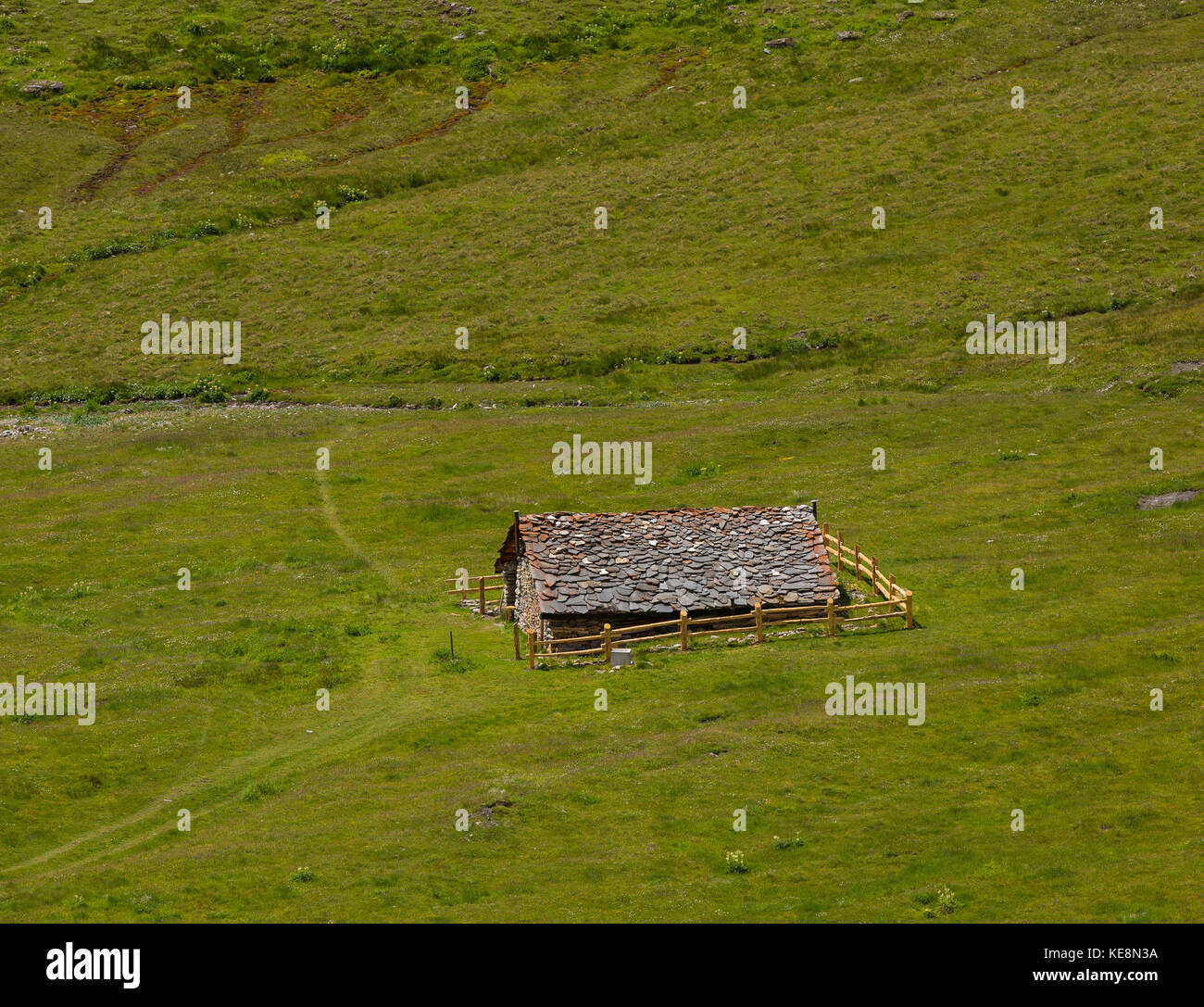 MOIRY VALLEY, SWITZERLAND - Small hut in pasture, Pennine Alps in the ...
