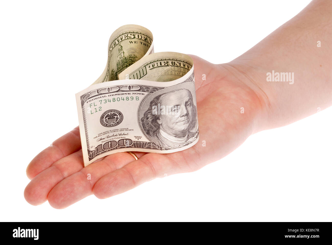 Heart shaped money, on white background. Clipping path included Stock ...