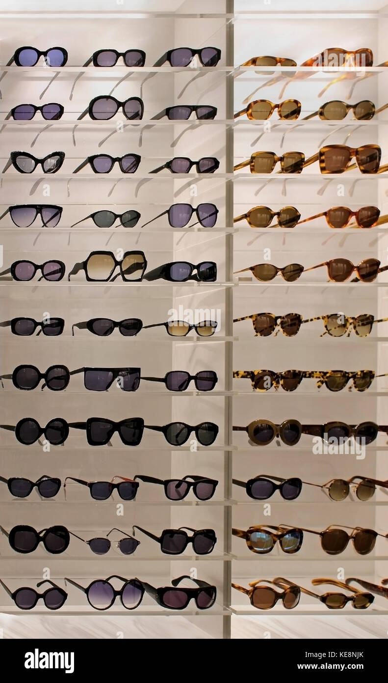 Large sunglasses selection on display in shop Stock Photo - Alamy