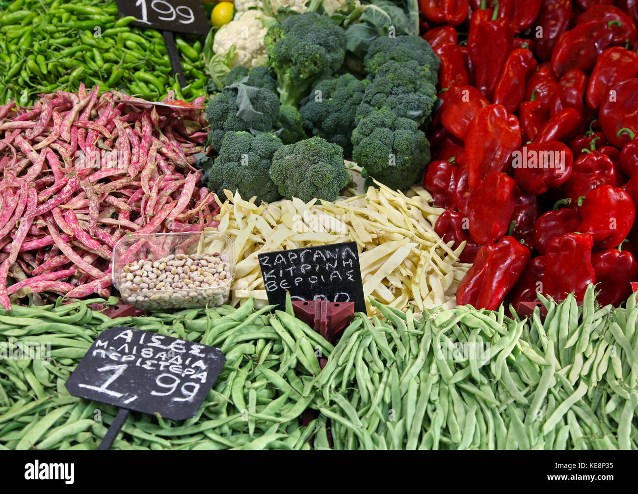 Big pile of fresh vegetables on market stall Stock Photo - Alamy