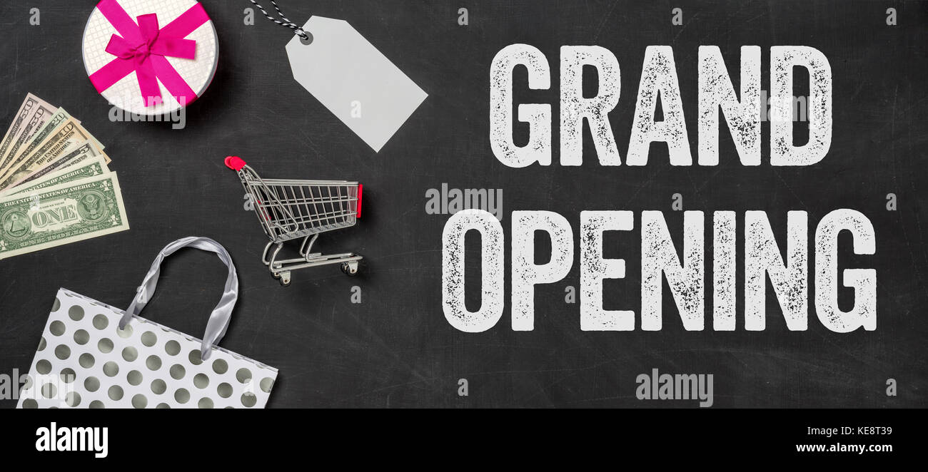 Shopping concept- Grand opening written on a blackboard Stock Photo - Alamy
