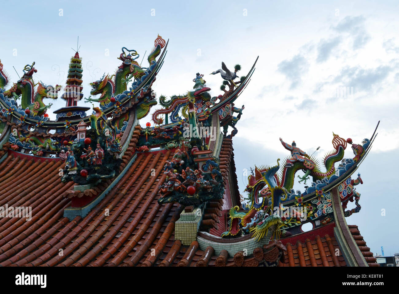 The detail of statues in a Chinese-style temple Stock Photo - Alamy