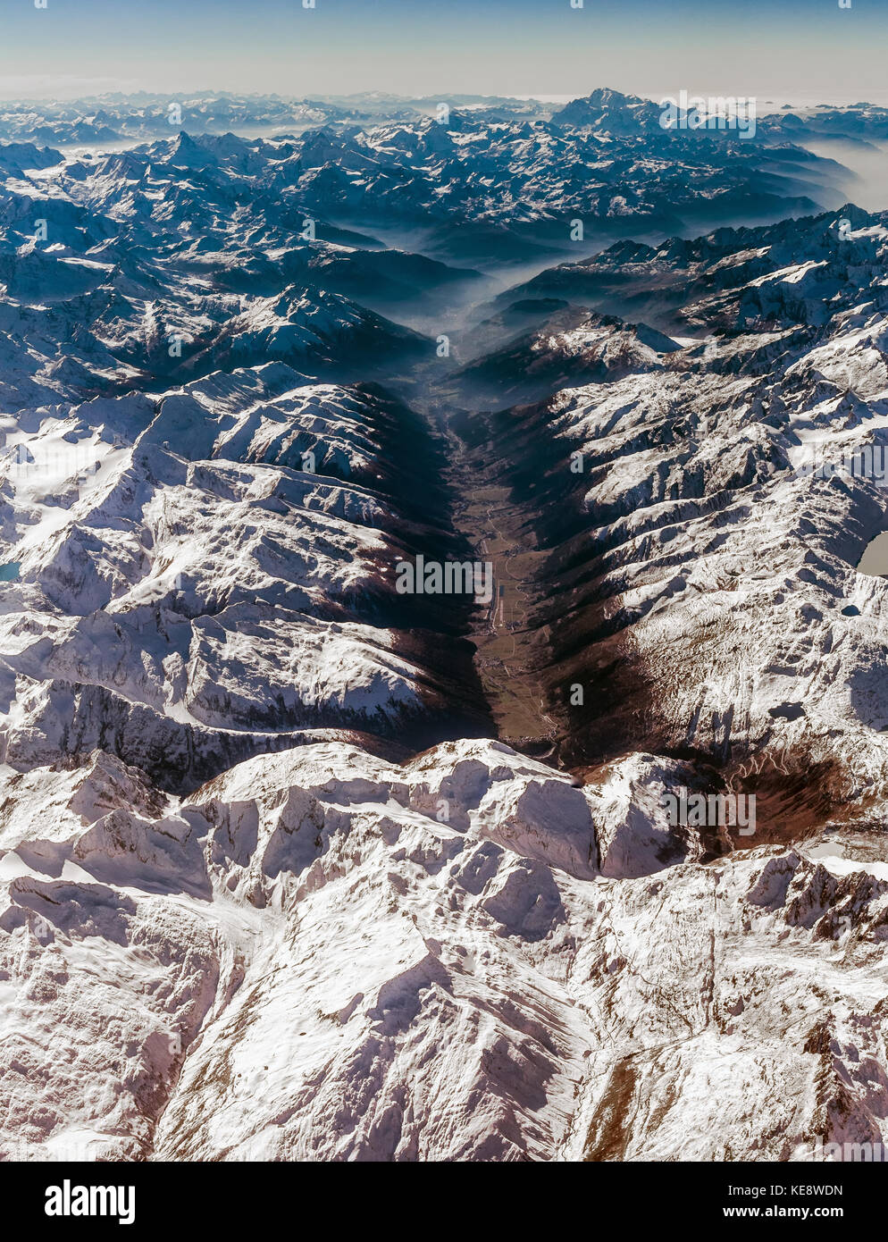 Aerial shot of the Alps taken from an altitude of 40,000ft Stock Photo ...