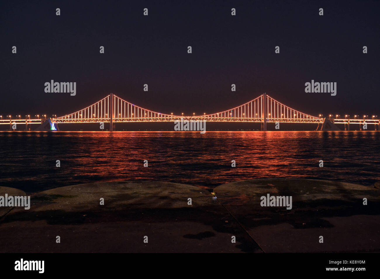The colorful bridge in Dalian city at night. Pic was taken in September ...