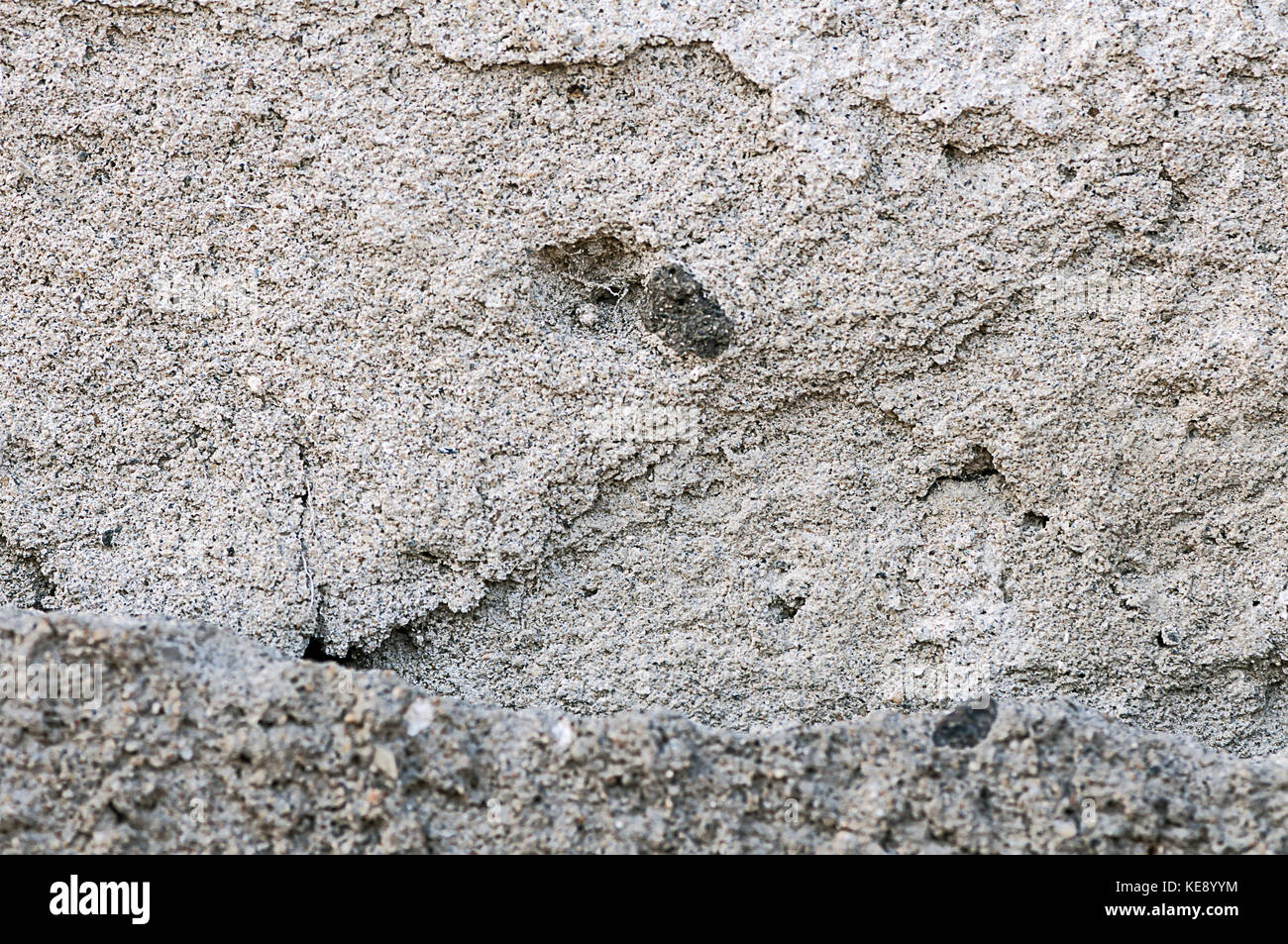 Brick wall. Broken plaster. Cracked and corroded cement Stock Photo - Alamy