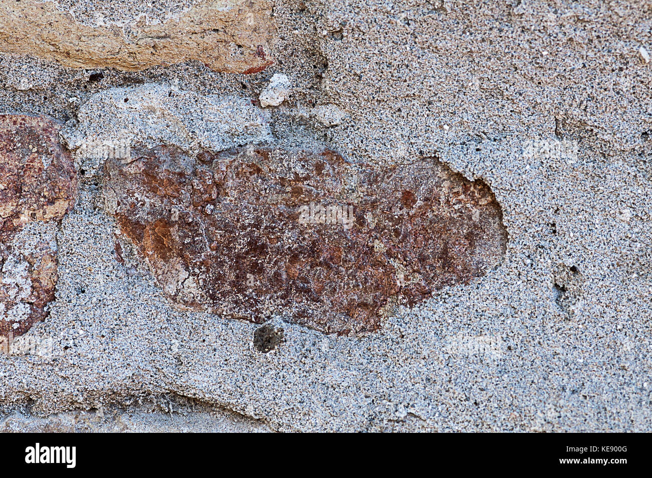 Brick wall. Broken plaster. Cracked and corroded cement Stock Photo - Alamy