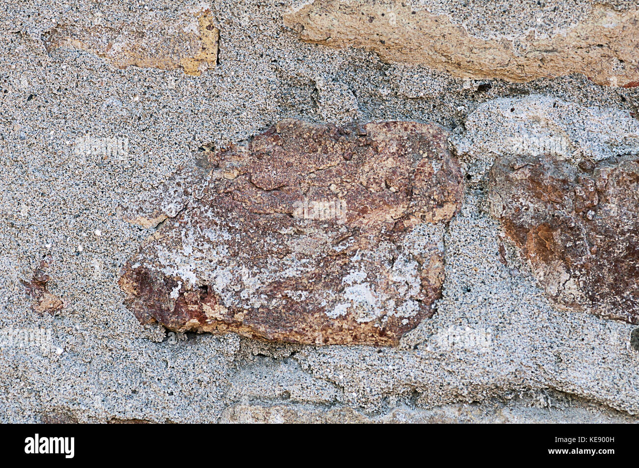 Brick wall. Broken plaster. Cracked and corroded cement Stock Photo - Alamy