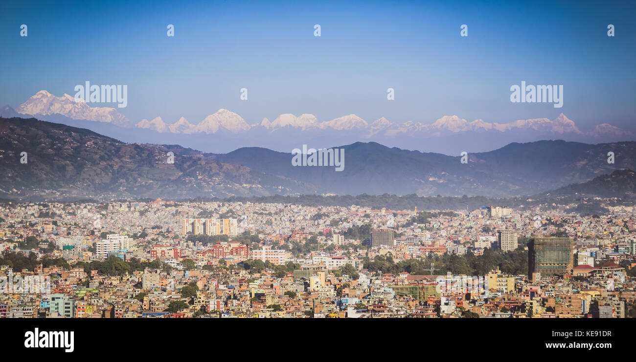 Himalayas towering over Kathmandu cityscape, Nepal Stock Photo - Alamy