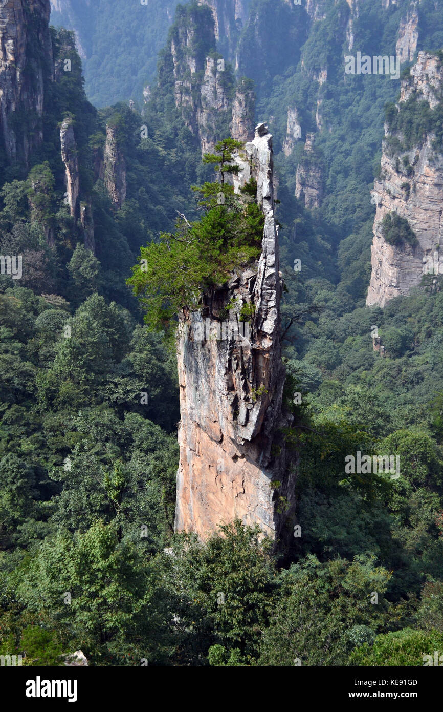 Single rock standing around Wulingyuan Scenic Area. What a dramatic ...