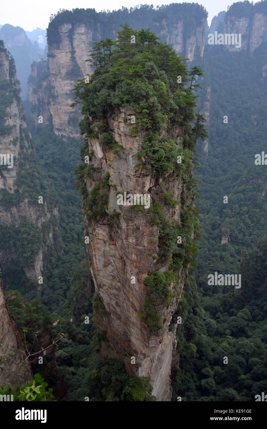 Single rock standing around Wulingyuan Scenic Area. What a dramatic ...
