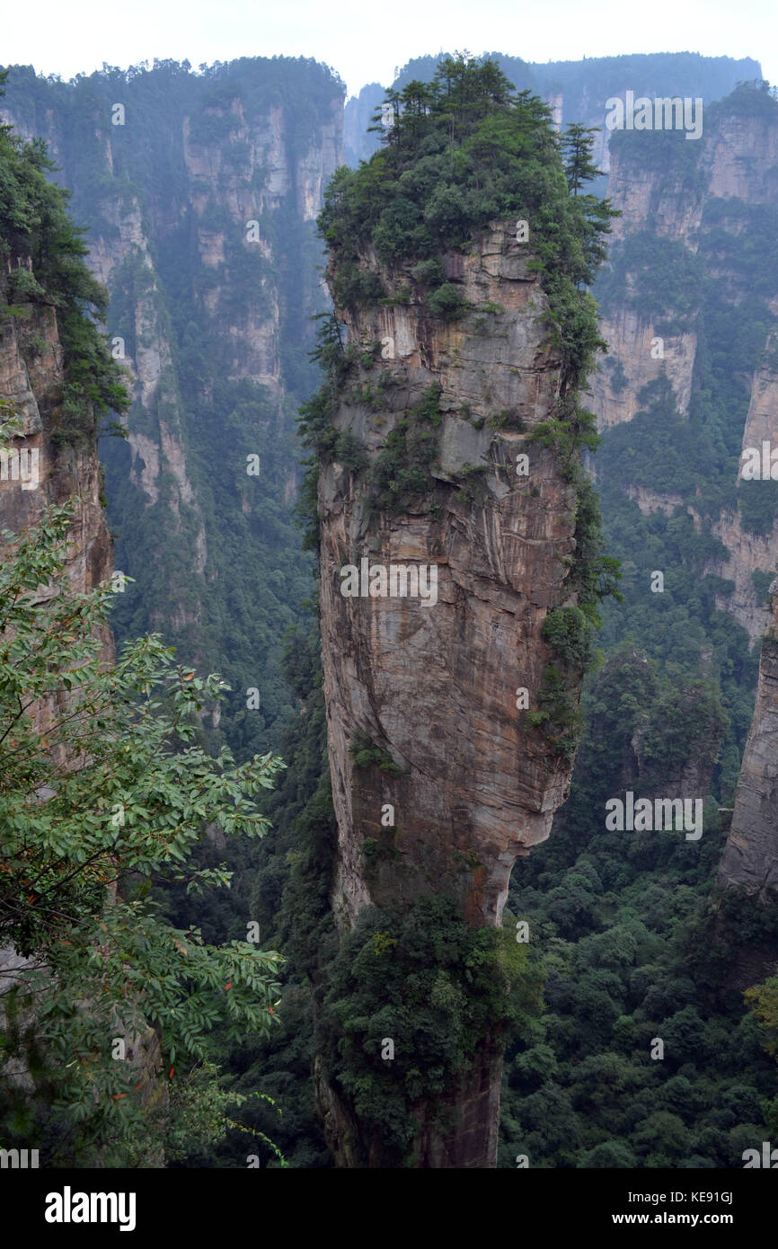 Single rock standing around Wulingyuan Scenic Area. What a dramatic ...