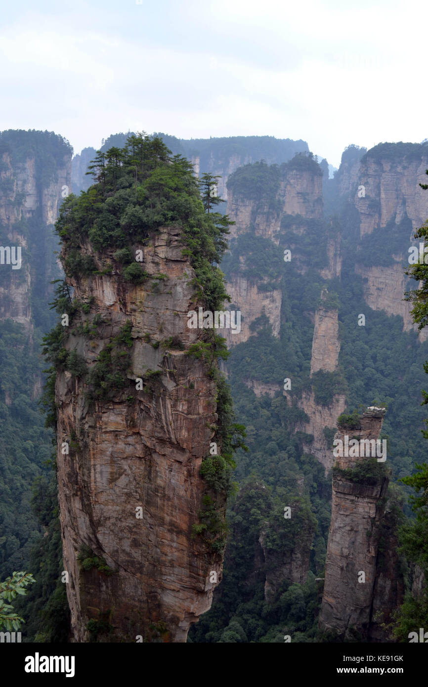 Single rock standing around Wulingyuan Scenic Area. What a dramatic ...