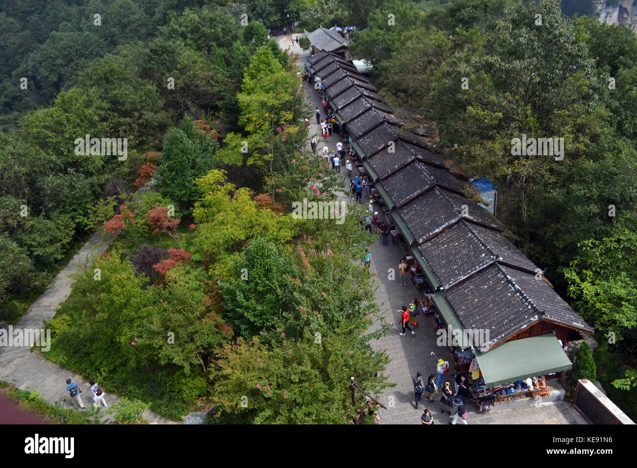 Tourists shopping around Wulingyuan Scenic Area. It's located at ...
