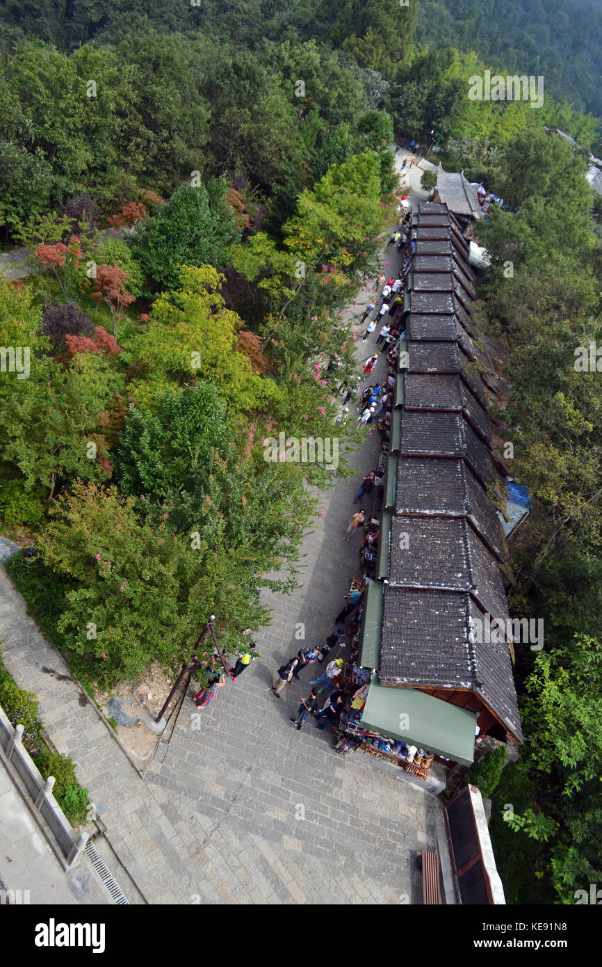 Tourists shopping around Wulingyuan Scenic Area. It's located at ...