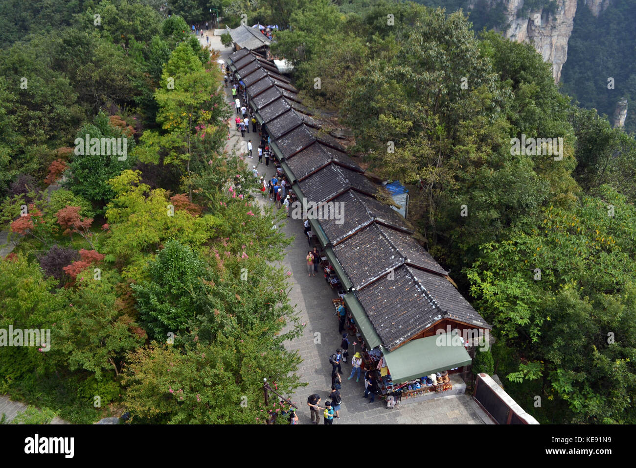 Tourists shopping around Wulingyuan Scenic Area. It's located at ...