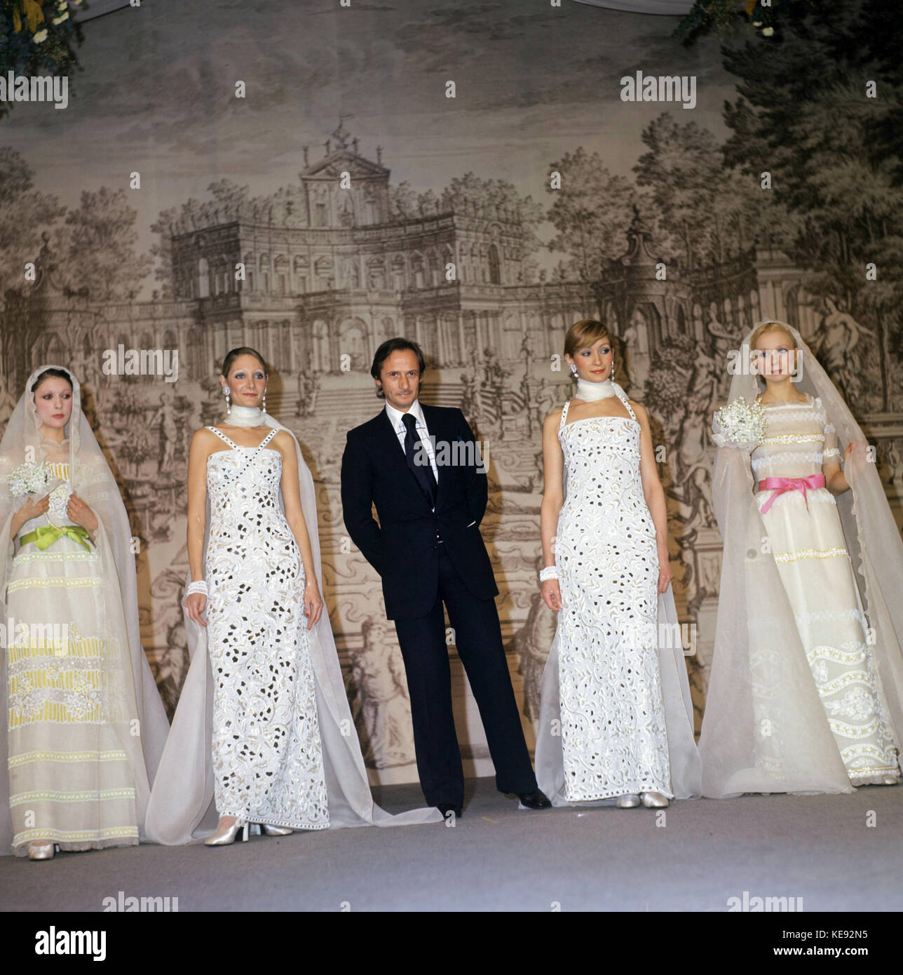 Dior designer Marc Bohan (M) at the end of his bridal fashion show in ...