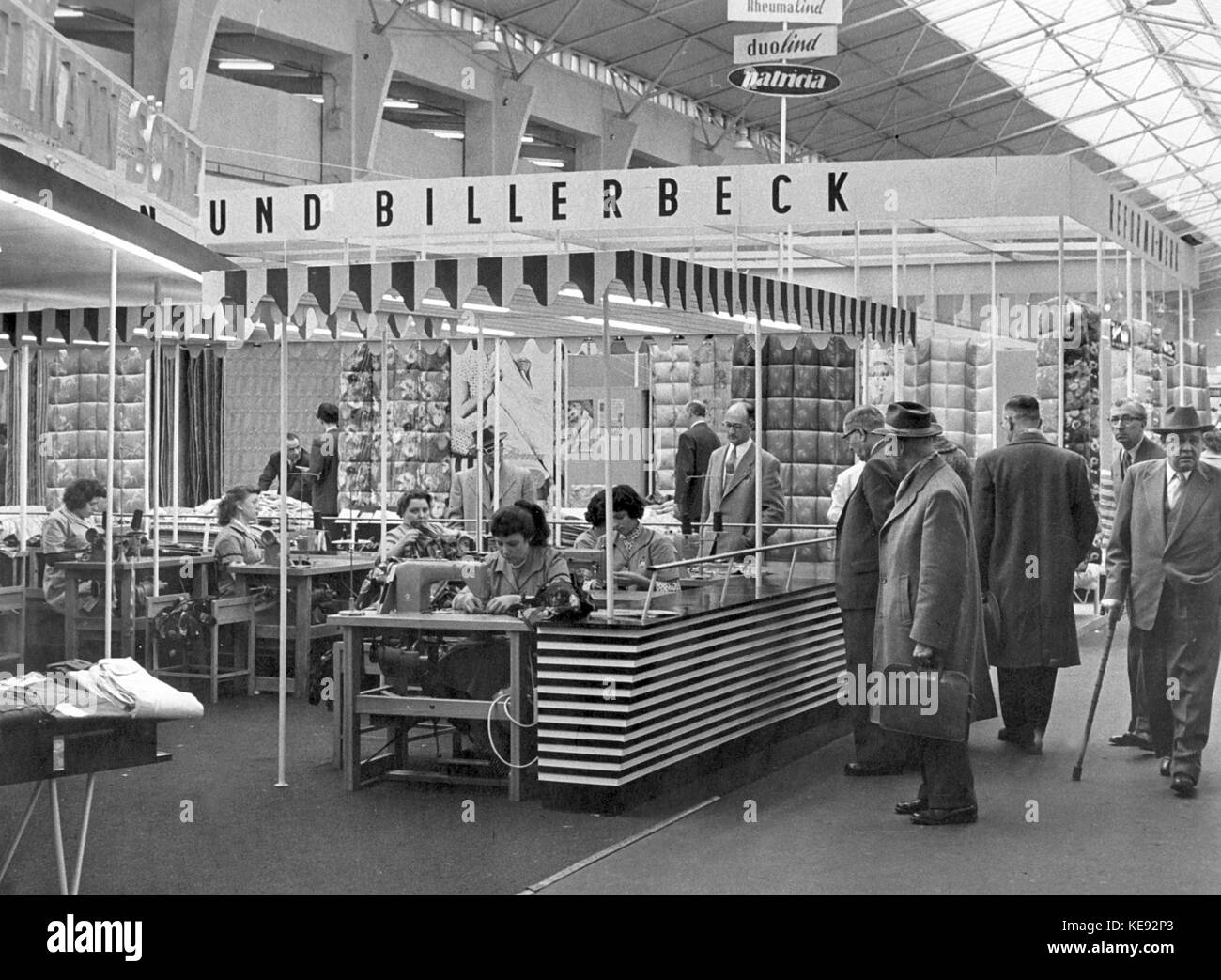 A stand at a textile and clothing fair 1957 in Cologne (North-Rhine ...