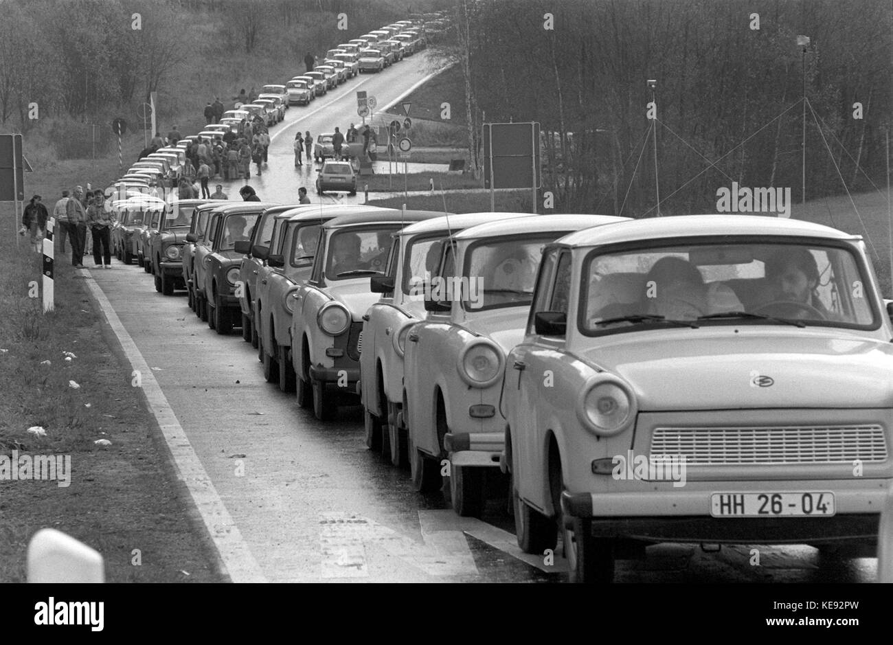 A seemingly endless line of GDR-cars (Trabi) at the borderline of ...