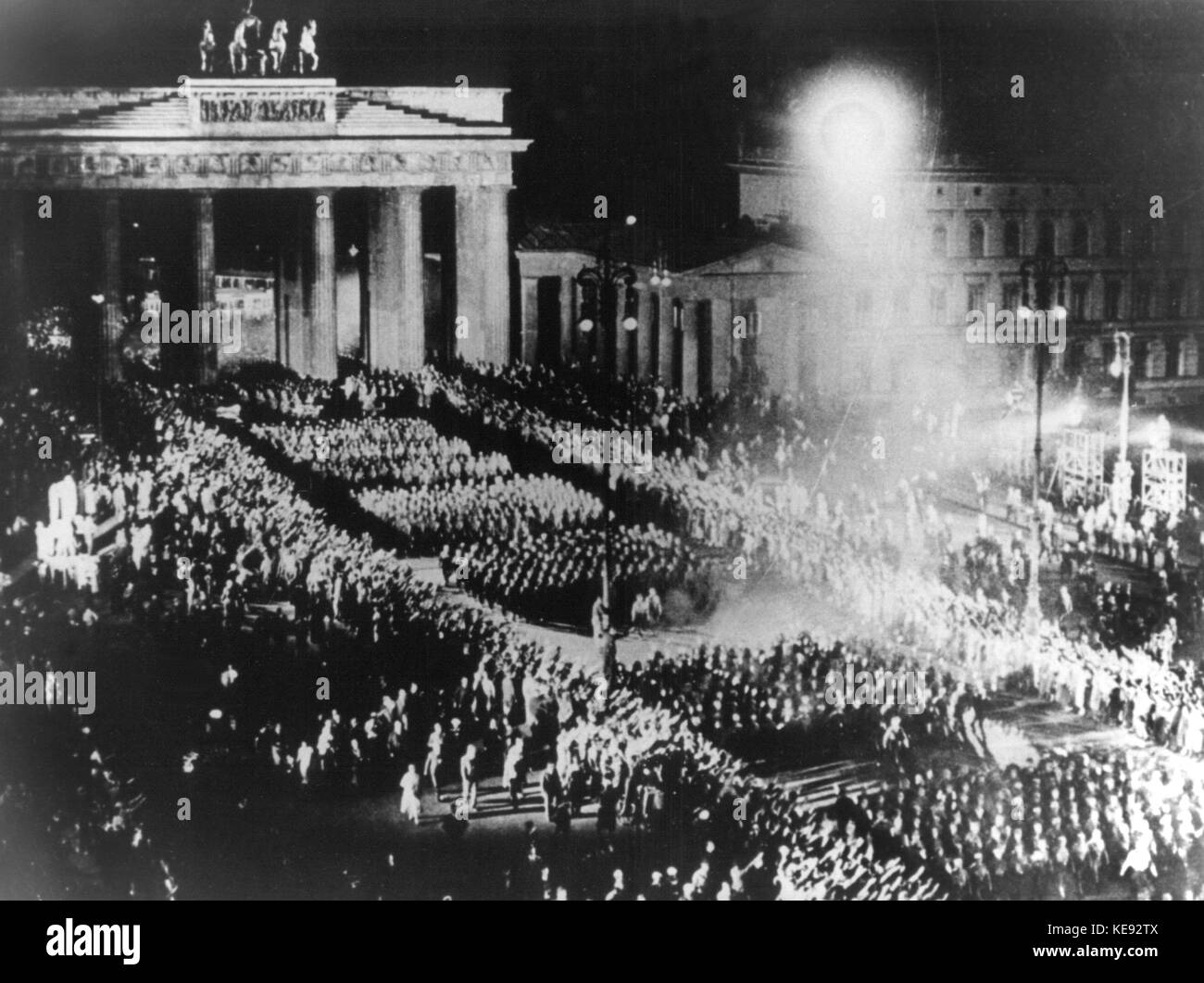 A scene of the torchlight procession of the SA at Brandenburg Gate. The ...