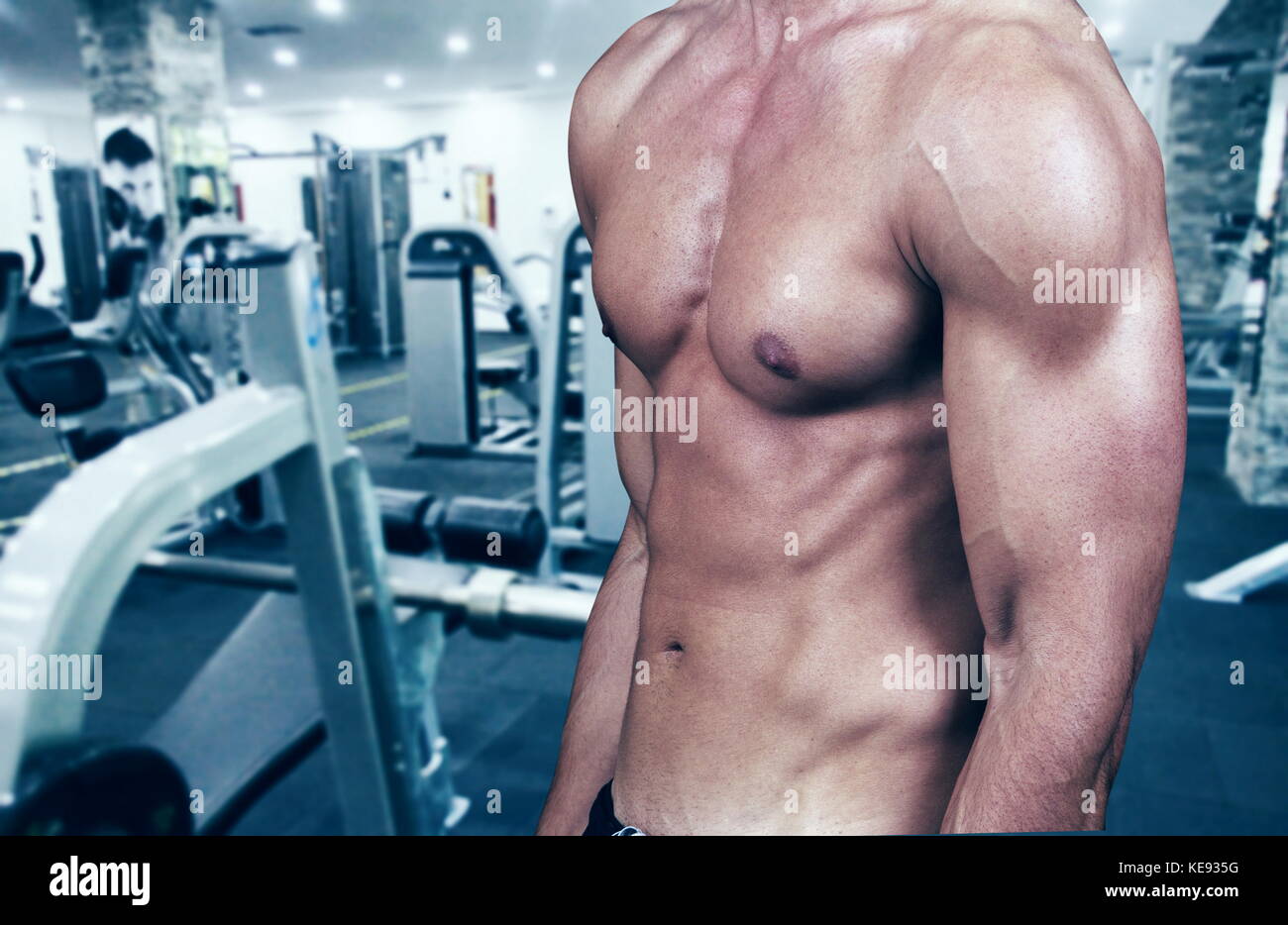 Strong man in the gym Stock Photo - Alamy