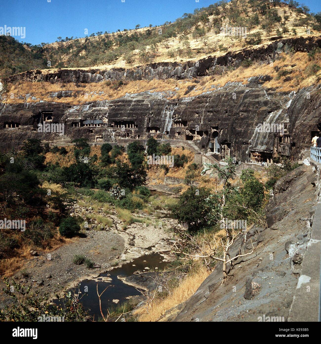 View of the temples carved out of the hillside near Ajanta, Maharashtra ...