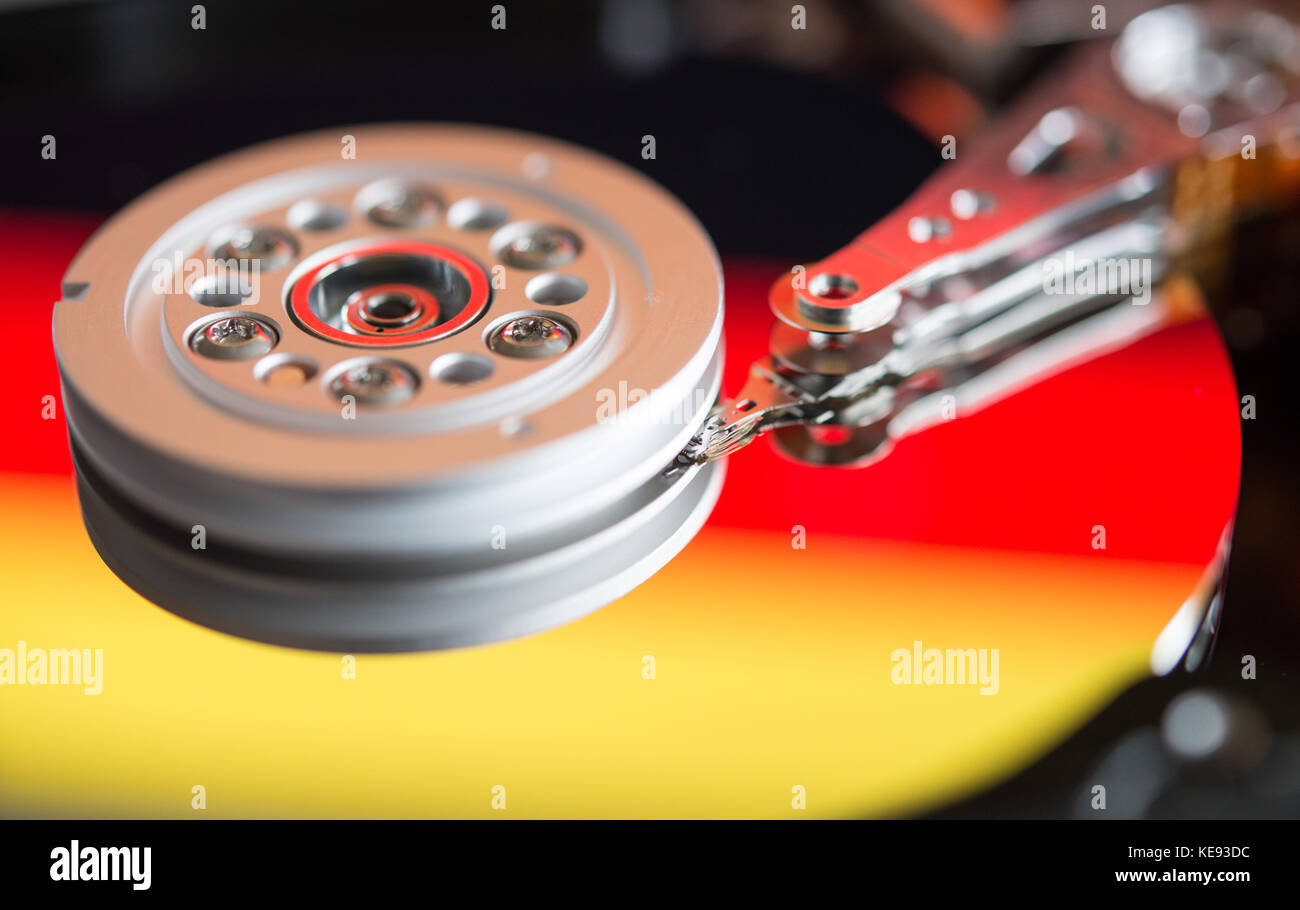 Illustration - Reflection of computer code writing on disc of open ...