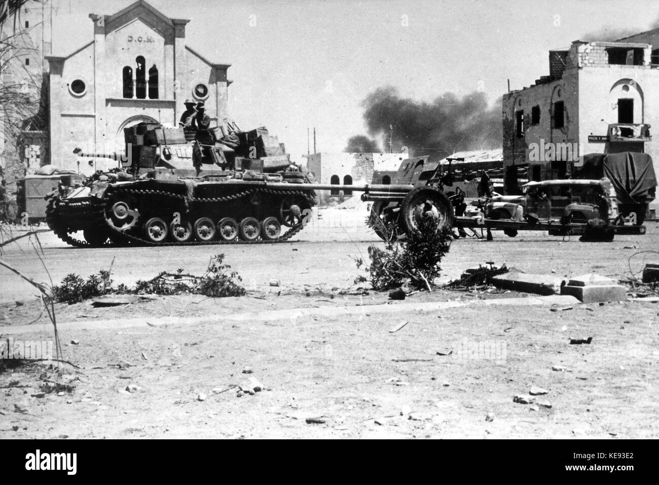 World War II. German tanks arrives the fallen city of Tobruk. The ...
