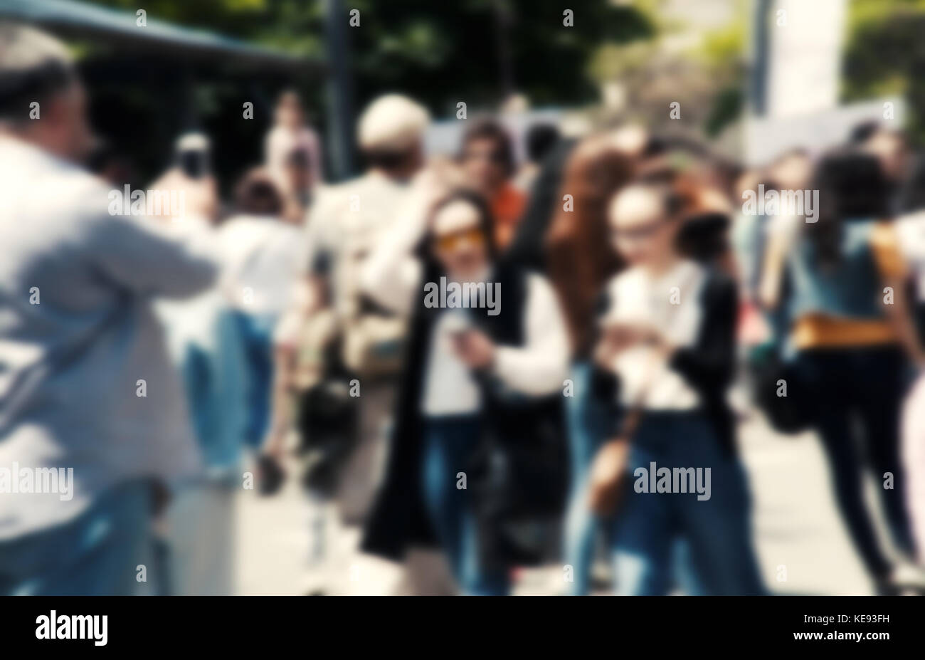 Blurred unfocused picture of people in street Stock Photo - Alamy