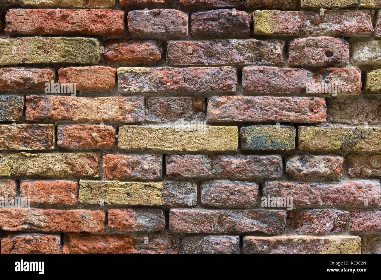 Detail of a colorful bricks wall Stock Photo - Alamy