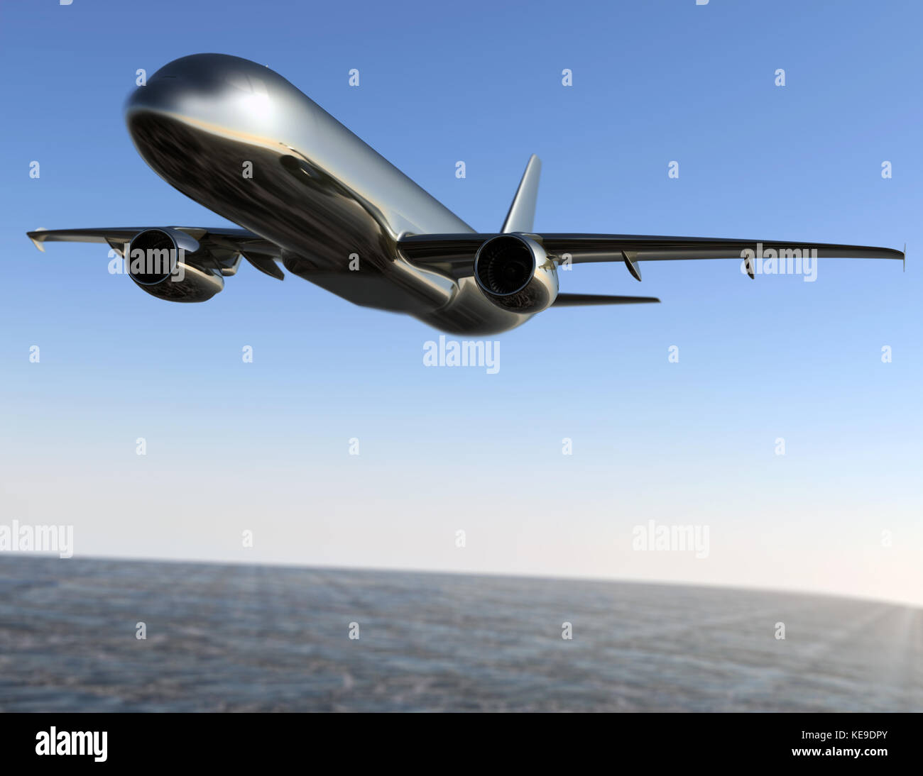 Shiny passenger aircraft flyby Stock Photo - Alamy